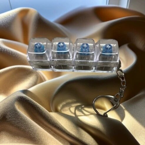 Механический брелок-антистресс 4 кнопки прозрачный черный Clear (with light)