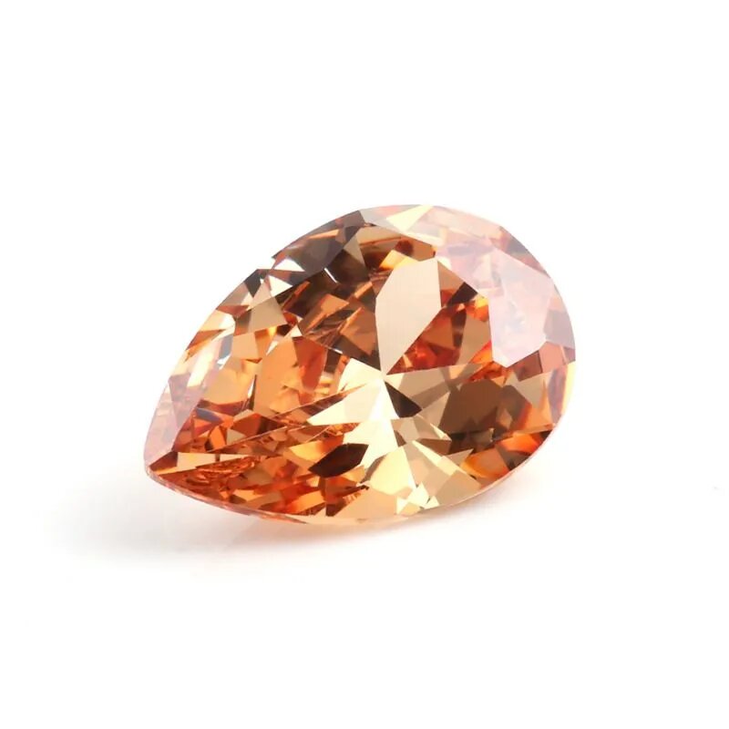 Цирконий грушевидной формы цвета шампанского 5х7 мм 50 шт