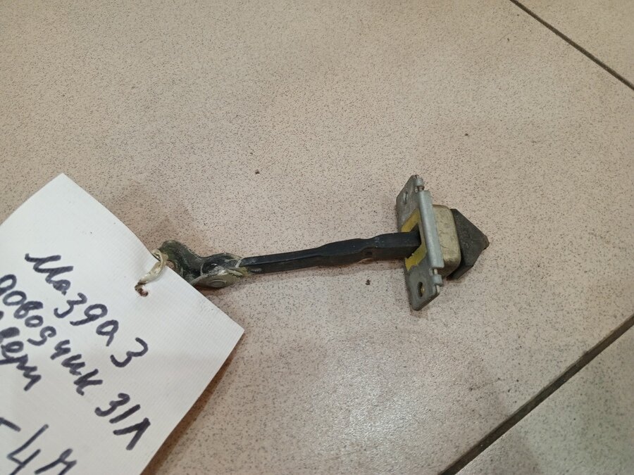 Ограничитель двери задней левой от Mazda 3 bk 2003-2009