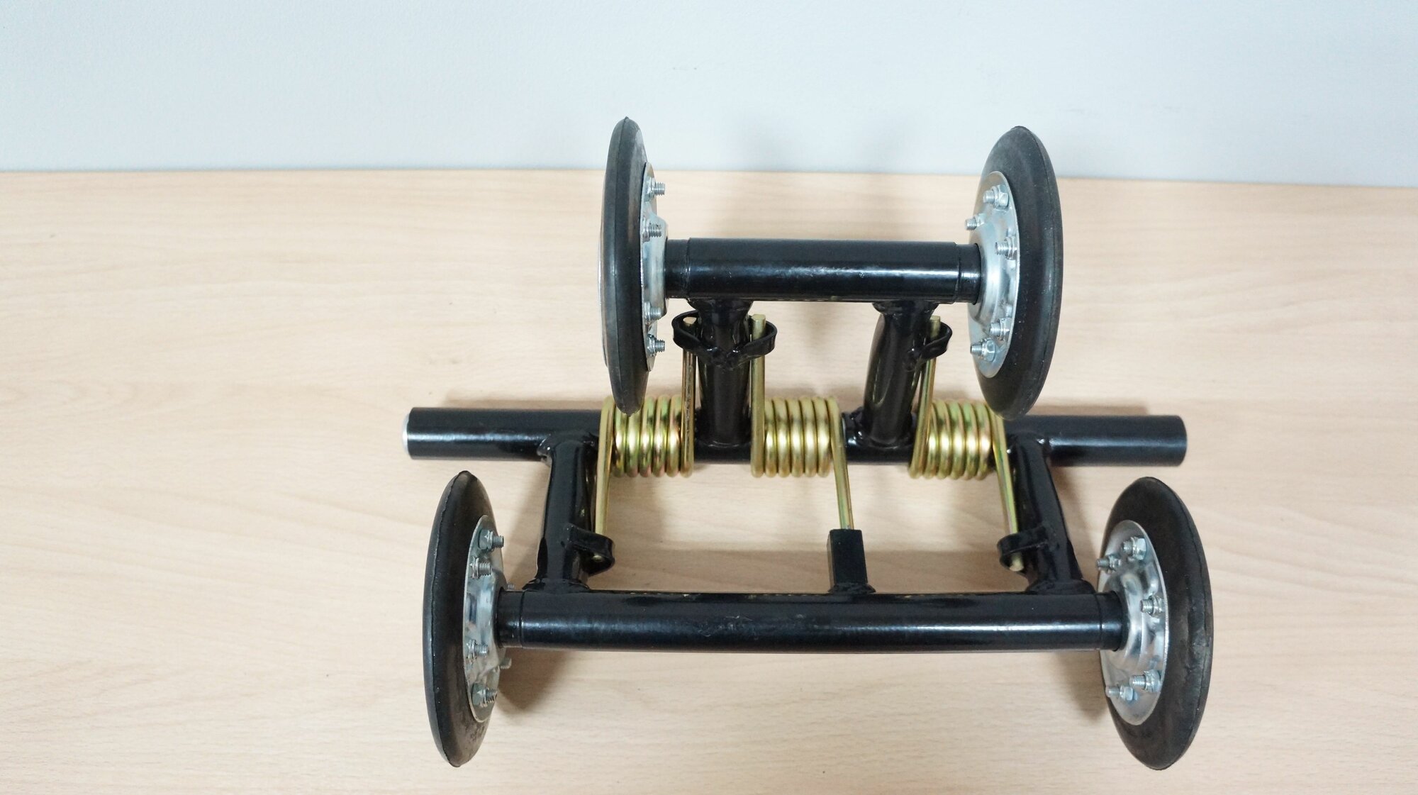 Балансир катков с резиновыми каточками 3-х пружинный Буран