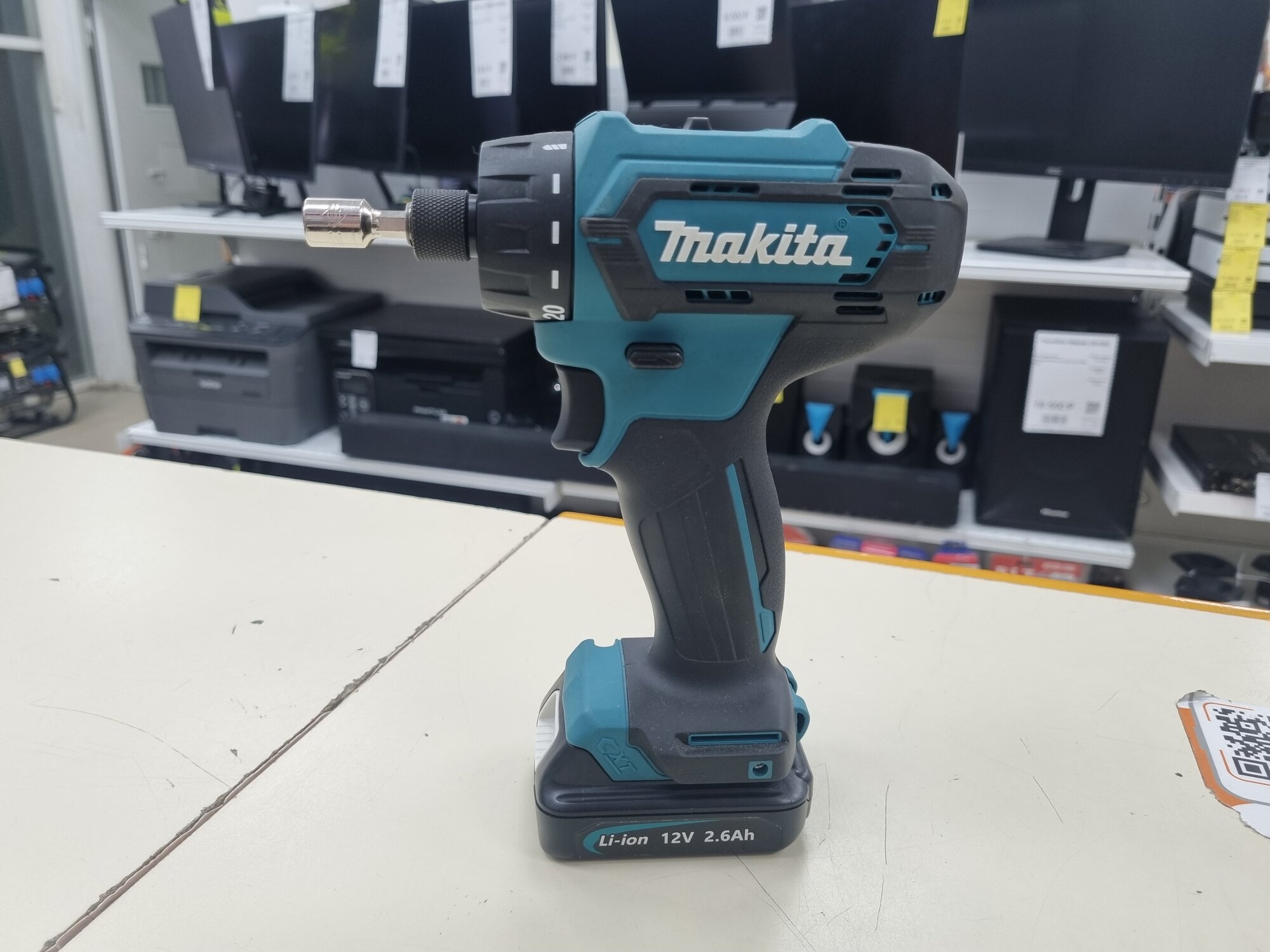 Дрель-шуруповерт аккумуляторная Makita DF033DWAE, 12 В Li-Ion 2х2 Ач