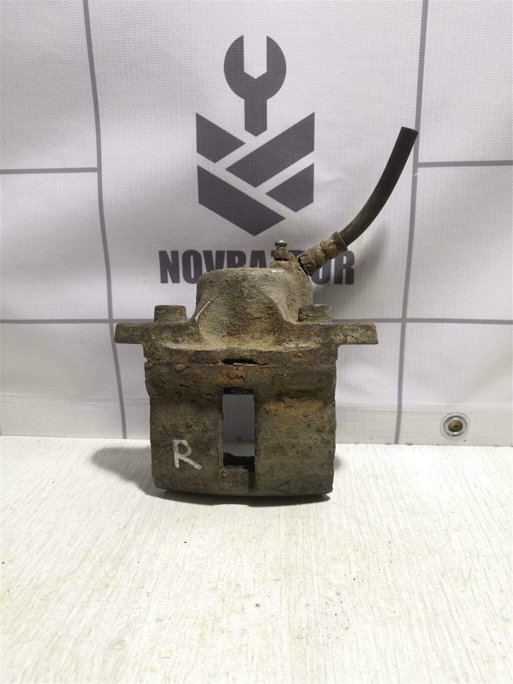 Суппорт передний левый Renault Logan 2005-2014