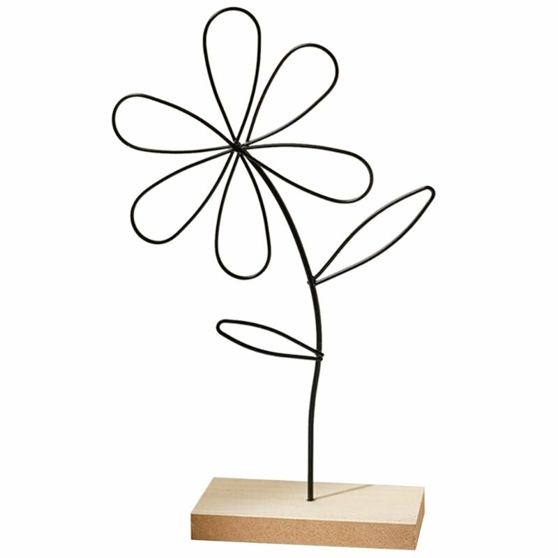 Золотая статуэтка листа гинкго на деревянной подставке