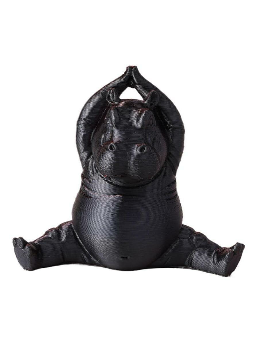 Симпатичная декоративная статуэтка бегемота