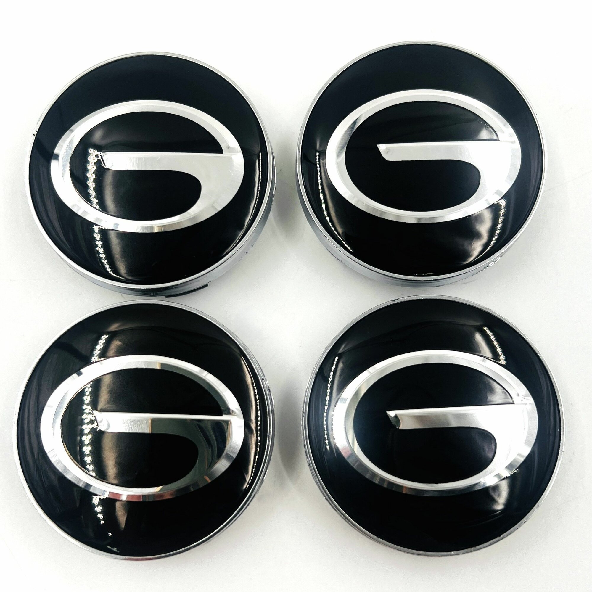 Колпачки заглушки на литые диски с эмблемой GAC черный 60 мм 4 шт