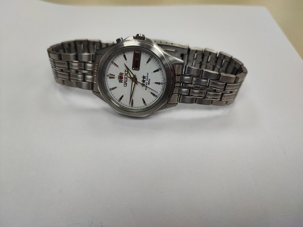 Часы наручные Orient EM5C-C0 CA, серебряные. Б/у, уценка.