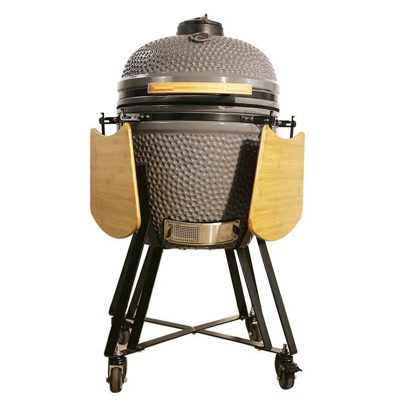 Многофункциональный большой керамический гриль-коптильня Egg Kamado для приготовления стейков на открытом воздухе в ресторане.