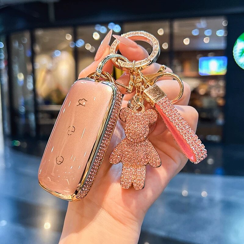Ключевой брелок Flowery Sand Pink со звездной диамантовой пряжкой и розовым стразовым медвежонком для Geely L7