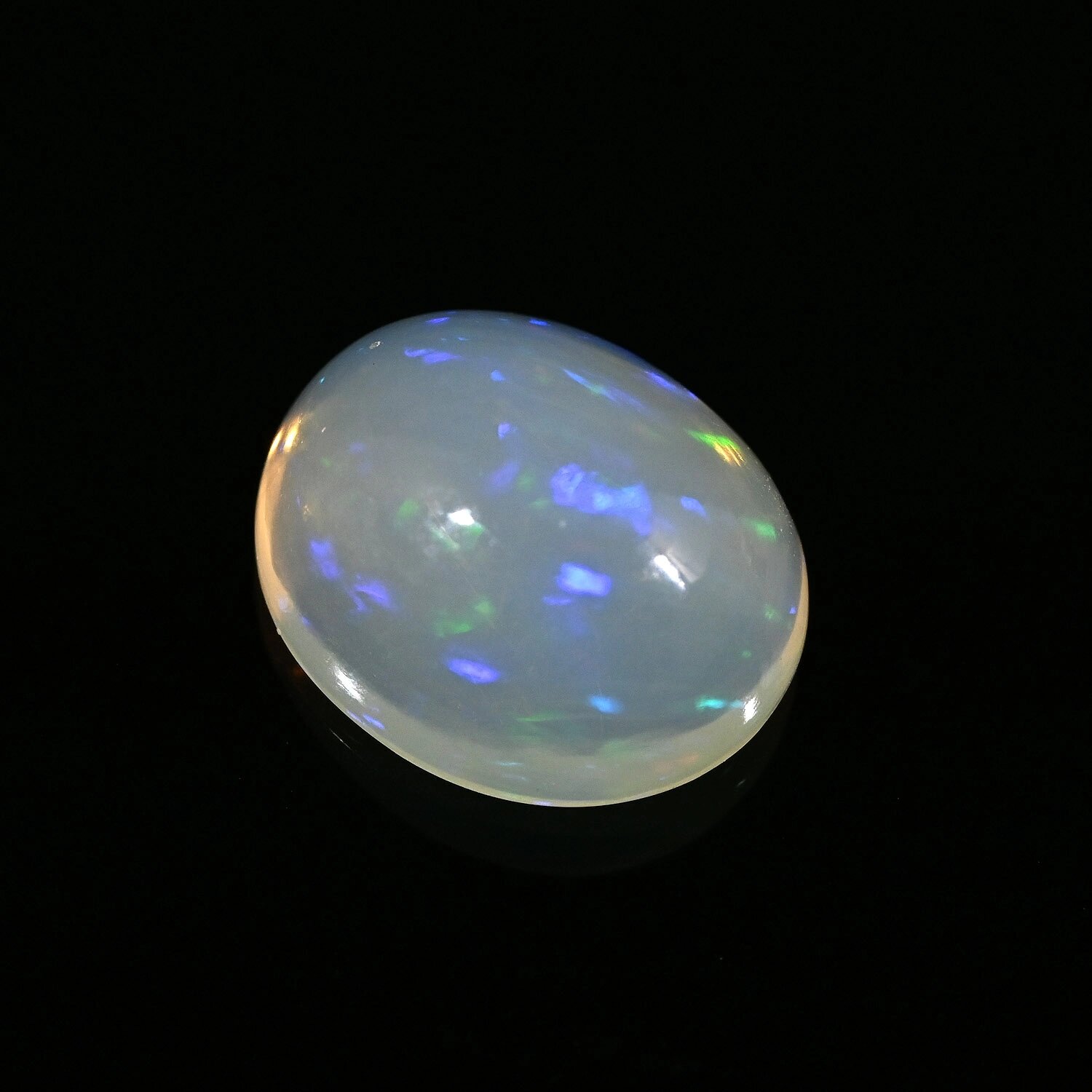 Кабошон из опала овал 11*13мм