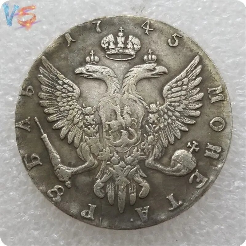 Монета/Монеты Это монета царской России, отчеканенная в 1745 году.