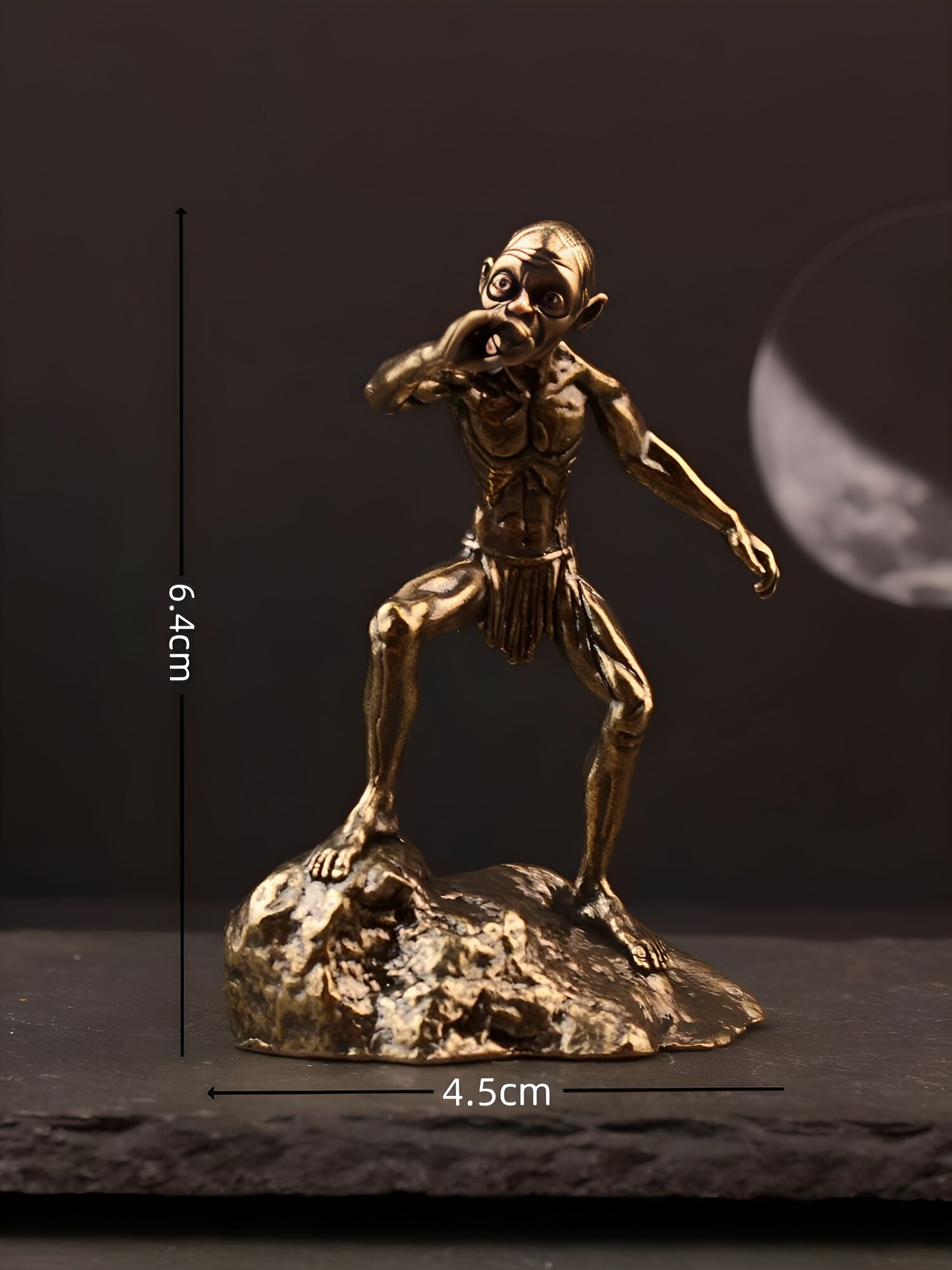 Фигурка примитивного человека из латуни