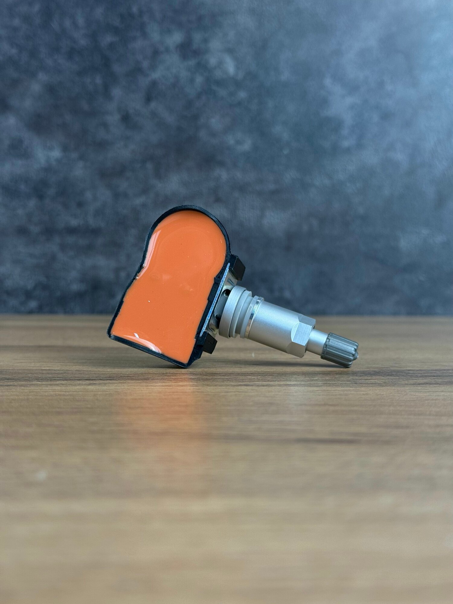 Датчик давления в шинах Nissan 407003JA0B. Новый, оригинальный.