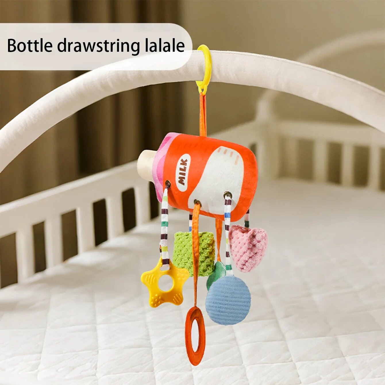 Подвесная игрушка для кроватки "Baby bottle" QBX200A