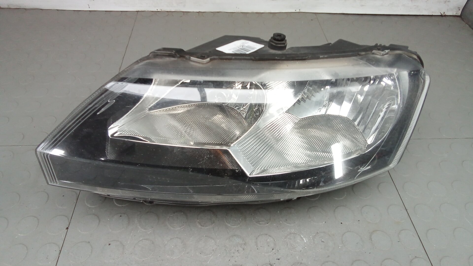 Фара левая SKODA RAPID