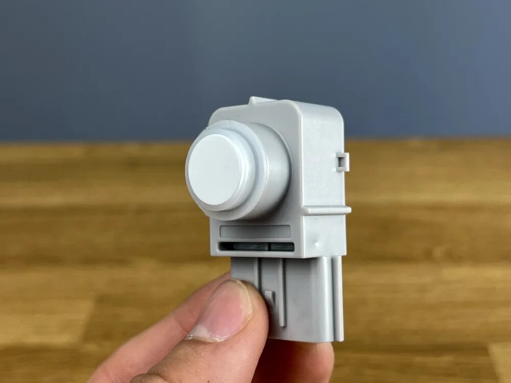 Датчик парктроника оригинальный Hyundai KIA 957202S201, штатный, белый