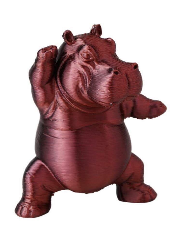 Симпатичная декоративная статуэтка бегемота