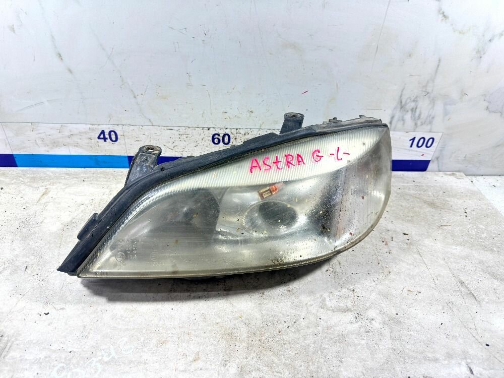 Фара левая Opel Astra G