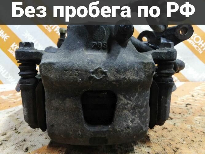 Суппорт Лево / Перед с пробегом Nissan Bluebird, Primera, Avenir, Prairie W10