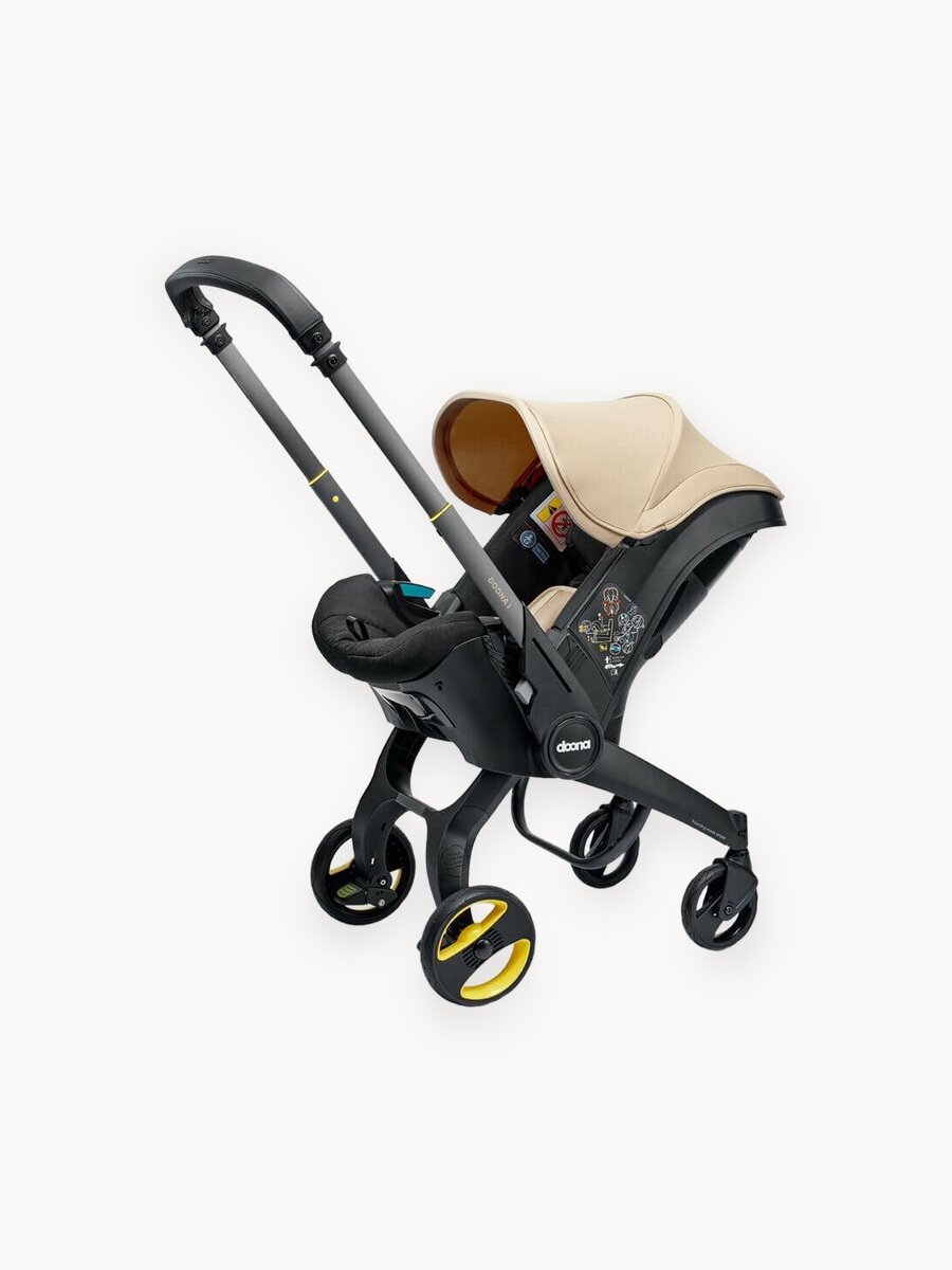 Doona i, коляска-автокресло до 1 года гр.0 (0-13 кг), цвет Sahara Sand