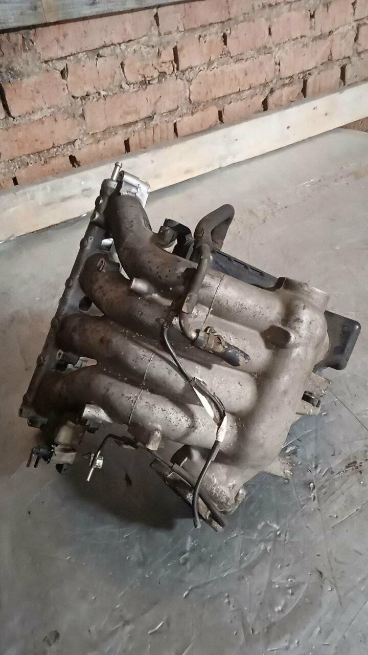 Впускной коллектор Mitsubishi Carisma рест. 2001 MR507324