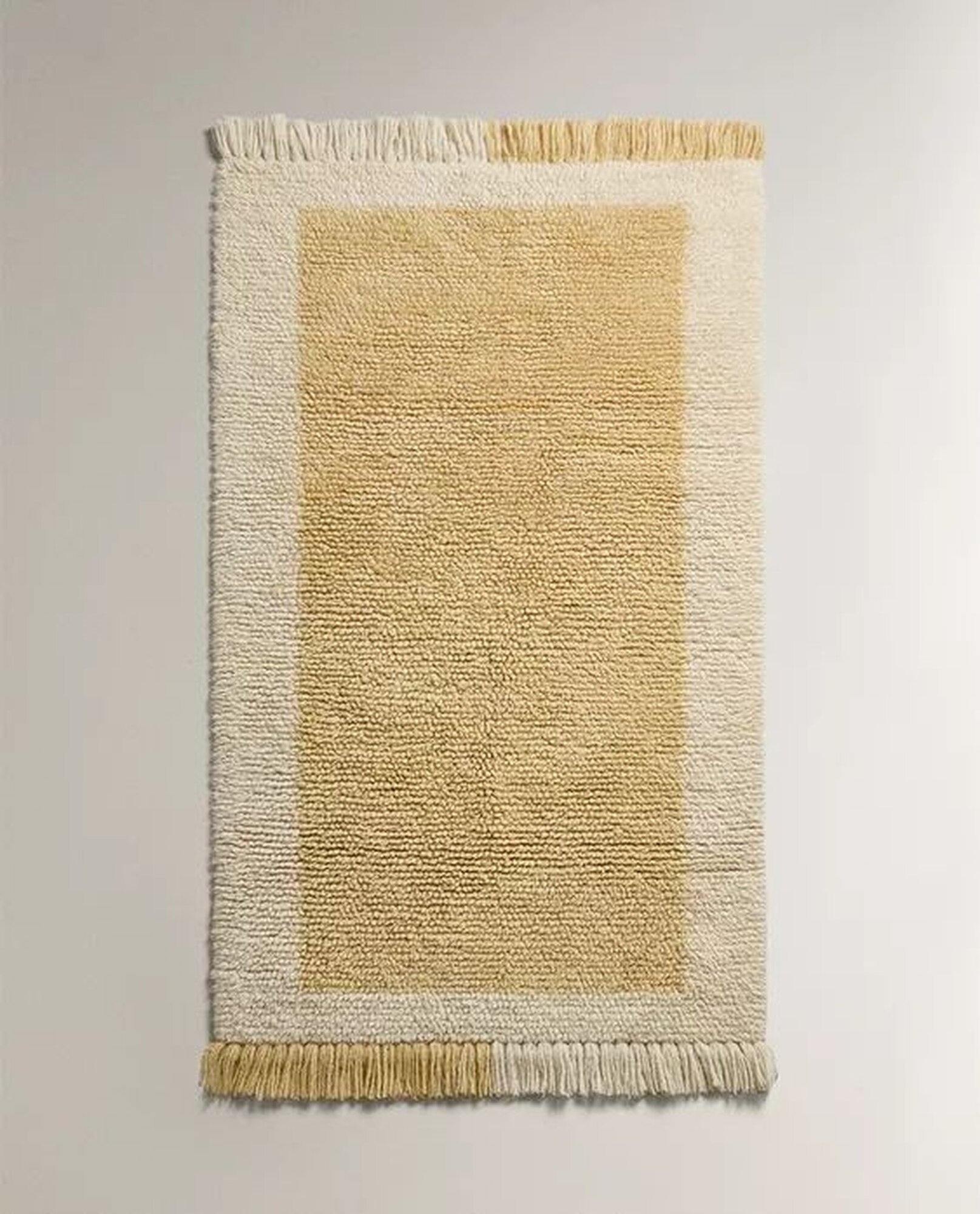 Детский ковер ZARA HOME 6658/029/052 - шерстяной, с цветными краями и бахромой, 90 x 150 см, светло-бежевый