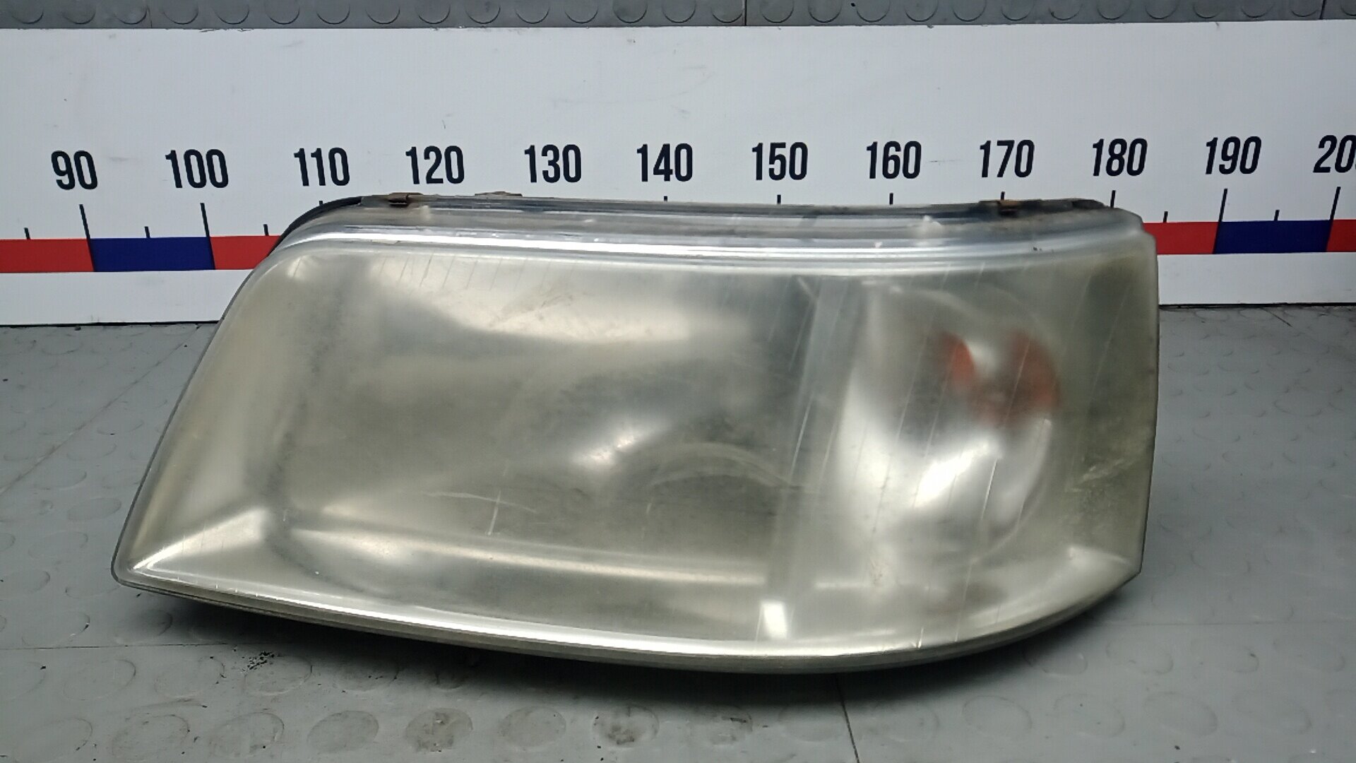 Фара левая VOLKSWAGEN TRANSPORTER T5