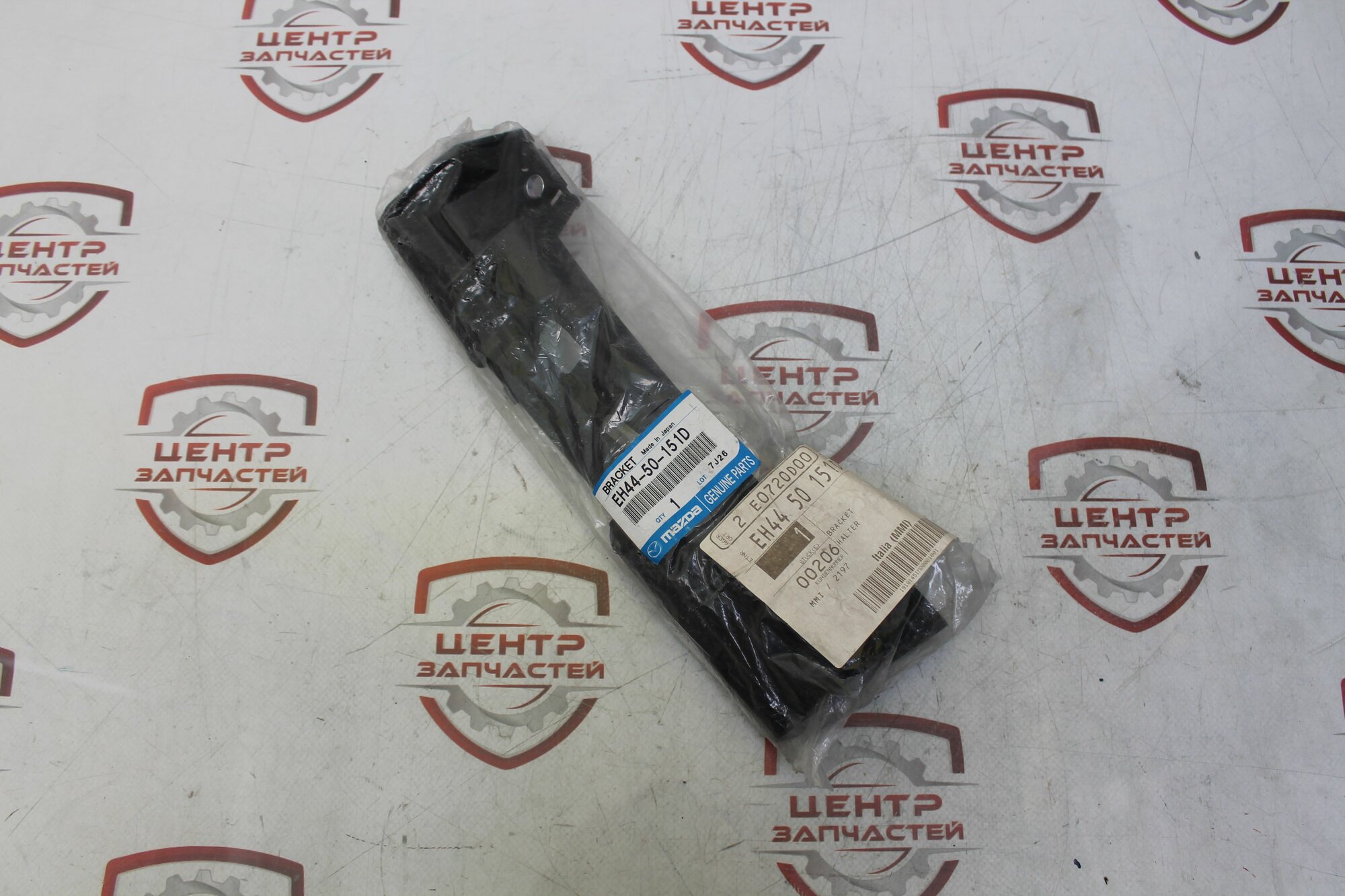 Кронштейн пластиковый MAZDA EH4450151D