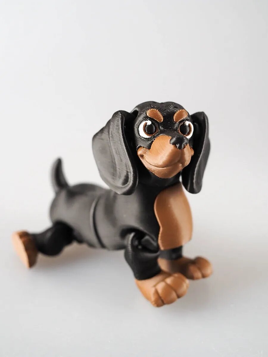 Собака Такса подвижная игрушка