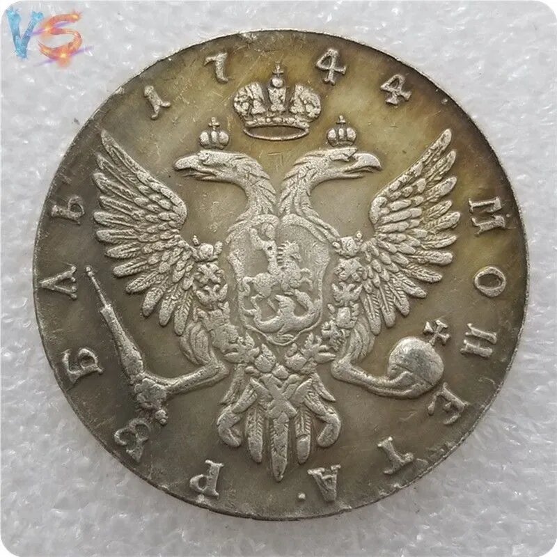 Монета/Монеты Это монета царской России, отчеканенная в 1744 году.