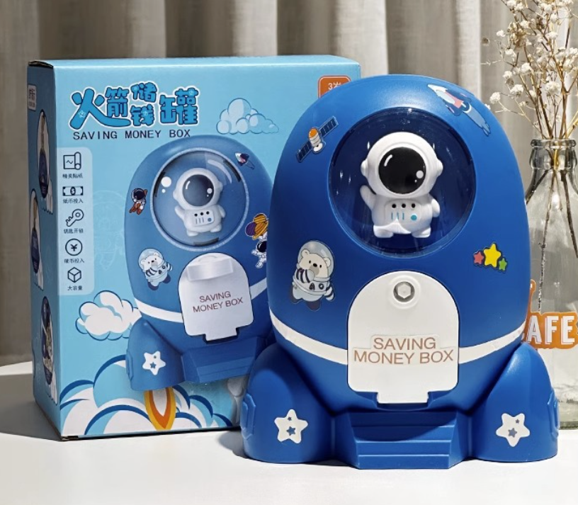 HAQI **Копилка-ракета для детей с ключом и наклейками космонавта | Развивающая игрушка для мальчиков и девочек | Подарок на день рождения, Новый год**