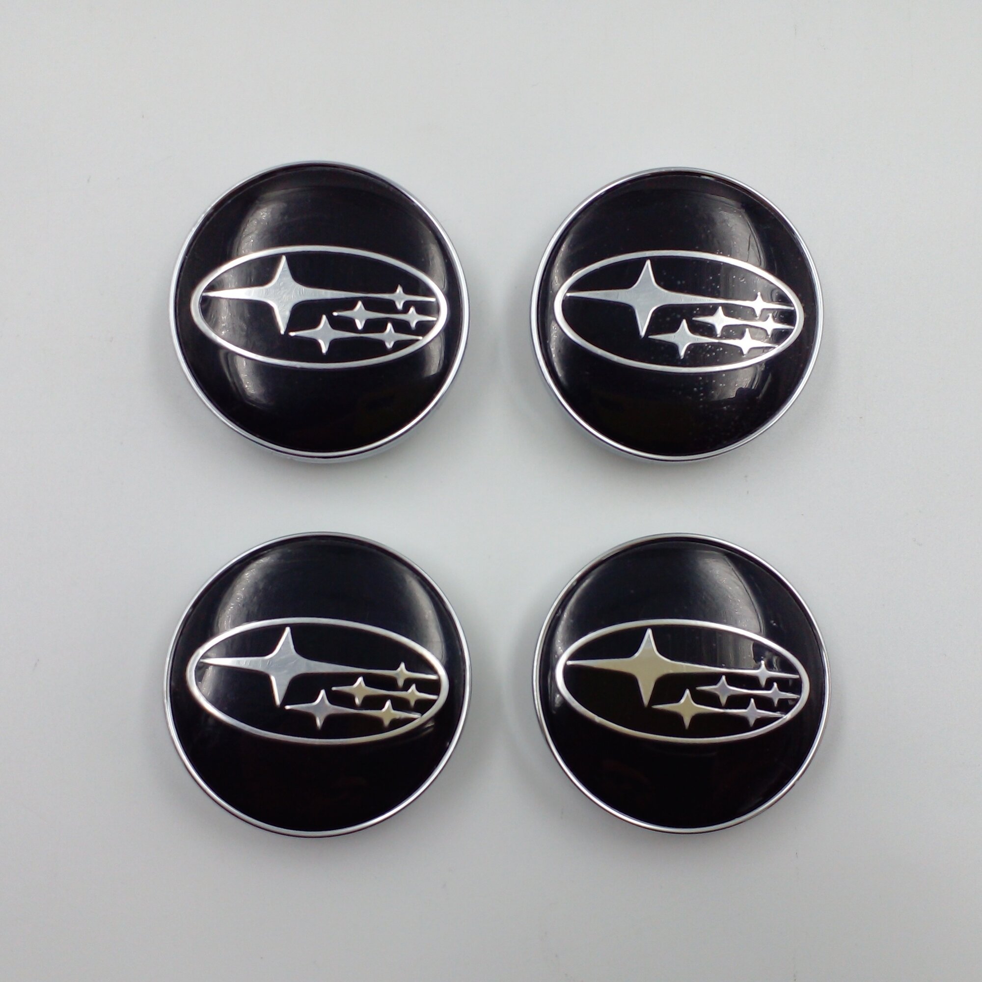 Колпачки заглушки на литые диски с эмблемой 60 мм 4 шт