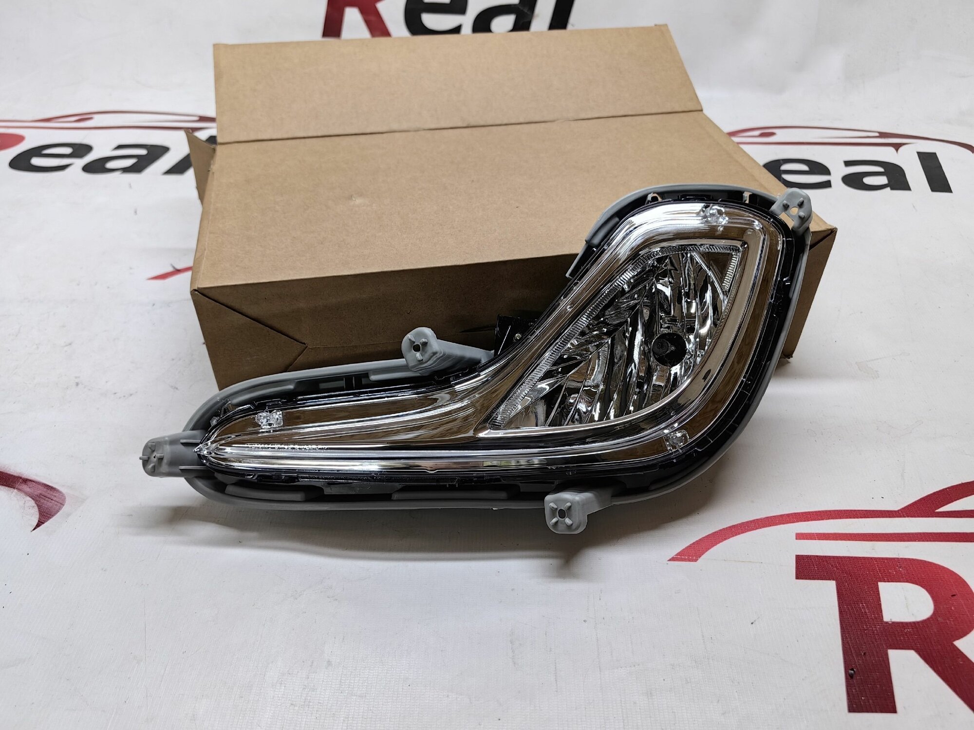 Фара противотуманная левая (ДХО) Хёндай Солярис (Hyundai Solaris) 2011г.