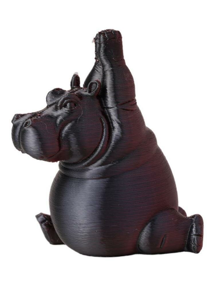 Симпатичная декоративная статуэтка бегемота
