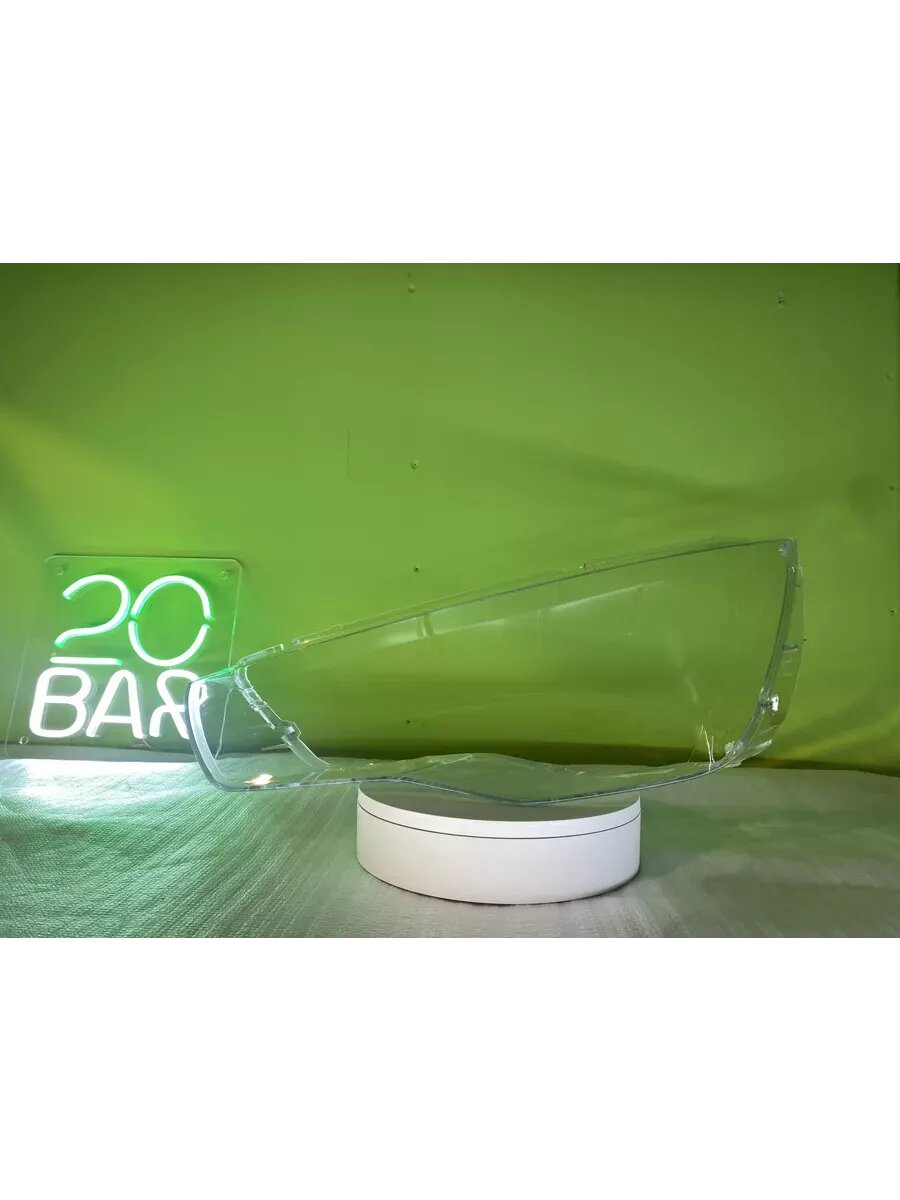 Стекло фары A1 2010-2015 дорест левое