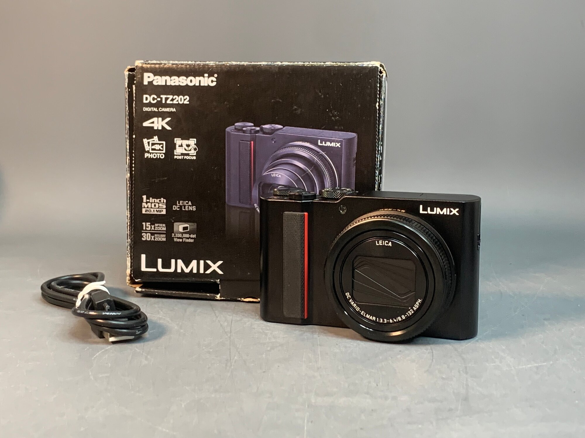 Panasonic Lumix DC-TZ202, налет на линзе