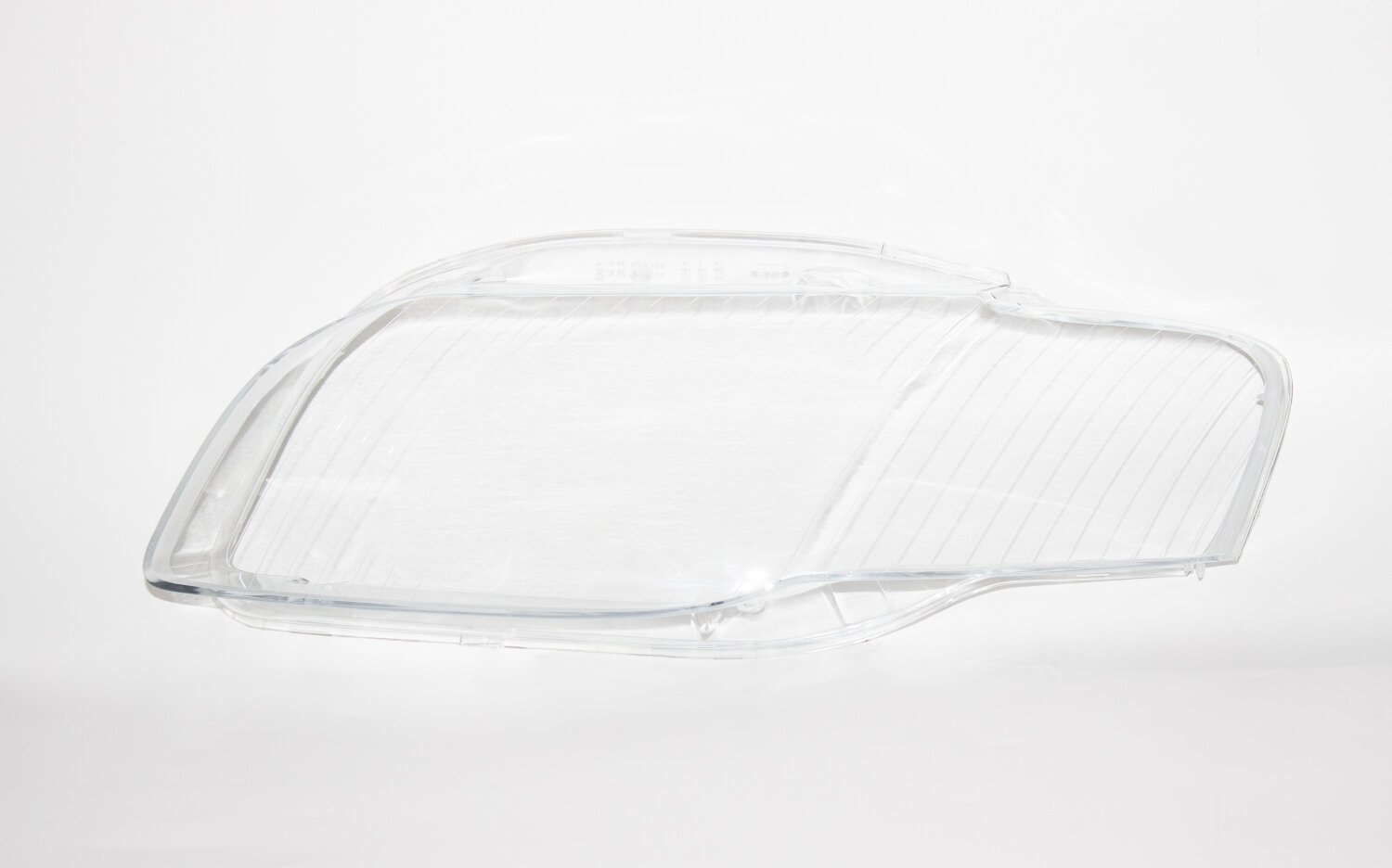 Стекло фары AUDI A4 B7 (2004-2007) (левое)