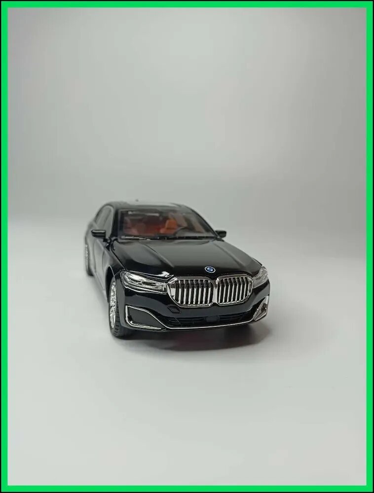 Игрушечная машинка BMW M7 черного цвета металлическая инерционная модель 1:24 — фото 1