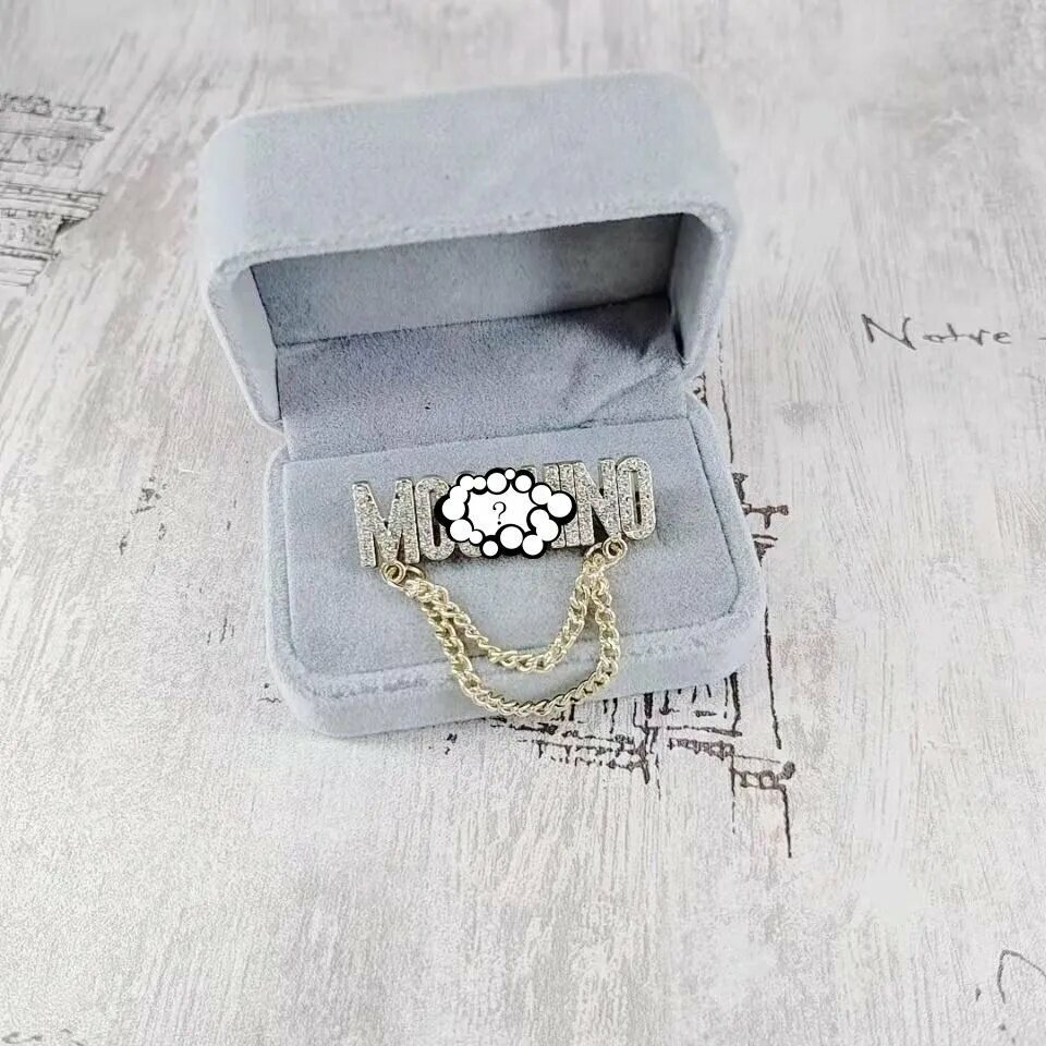 Moschino Брошь