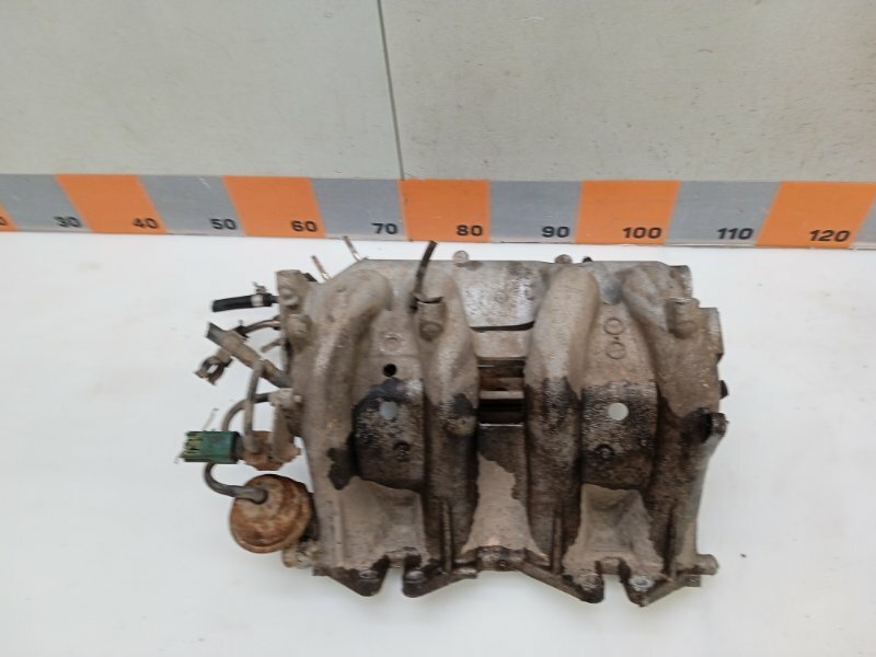 Б/У 1.5 Ниссан Альмера Н16 Коллектор впускной Nissan Almera 2000 N16 269799 NISSAN арт. 14001BM500