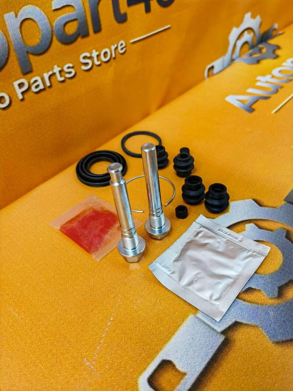 Ремкомплект заднего суппорта с направляющими лансер 9 Mitsubishi Lancer 9 на одну сторону