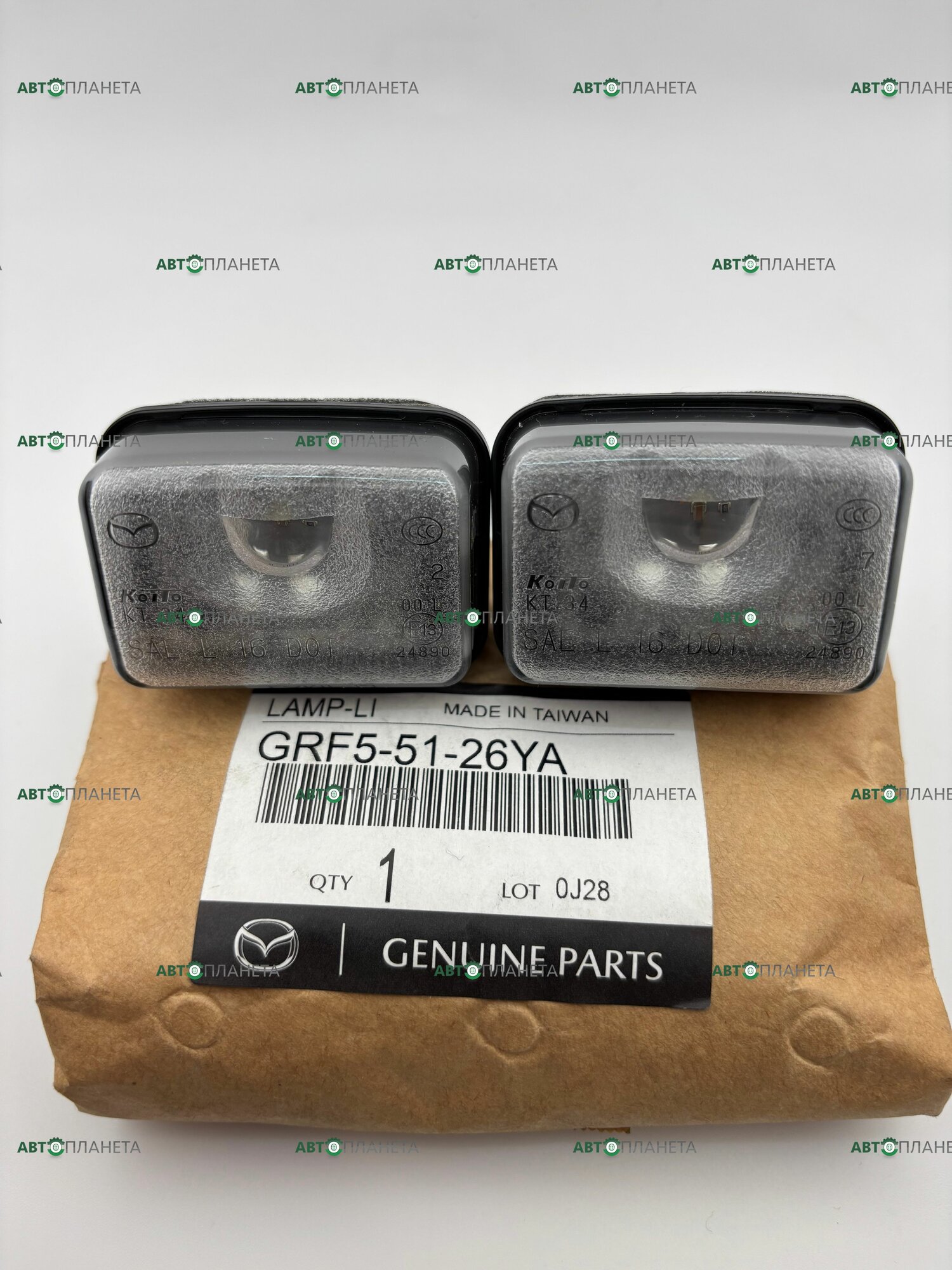 Фонарь подсветки номерного знака Mazda GRF55126YA