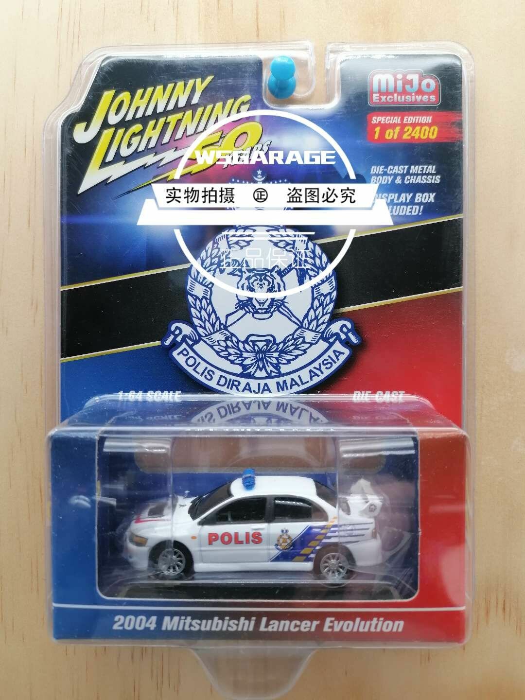 Johnny Lightning, литая модель 1:64, серия Mitsubishi Lancer Evolution(Малайзия Окрас полицейской машины)