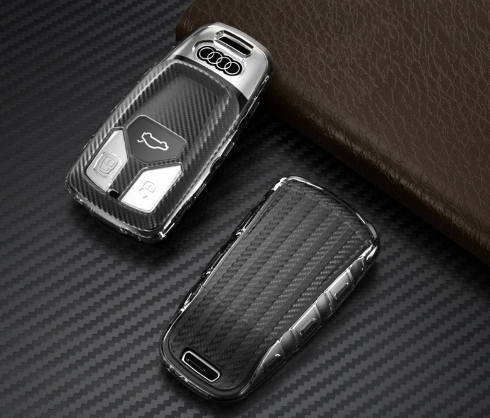 Защитный чехол MyPads M-237453 для автомобильного ключа Audi с вырезом под логотип, прозрачный с черным оттенком