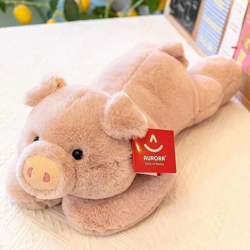 Мягкая игрушка Aurora World в виде белого медведя идеальна для успокоения детей. Размер: свинка - 30 см.