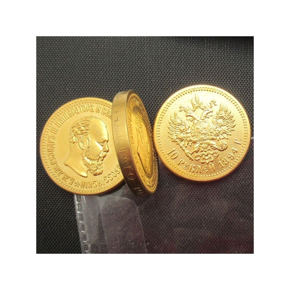 Позолоченные памятные монеты номиналом 10 рублей (1886-1894 гг.) в 9 моделях.