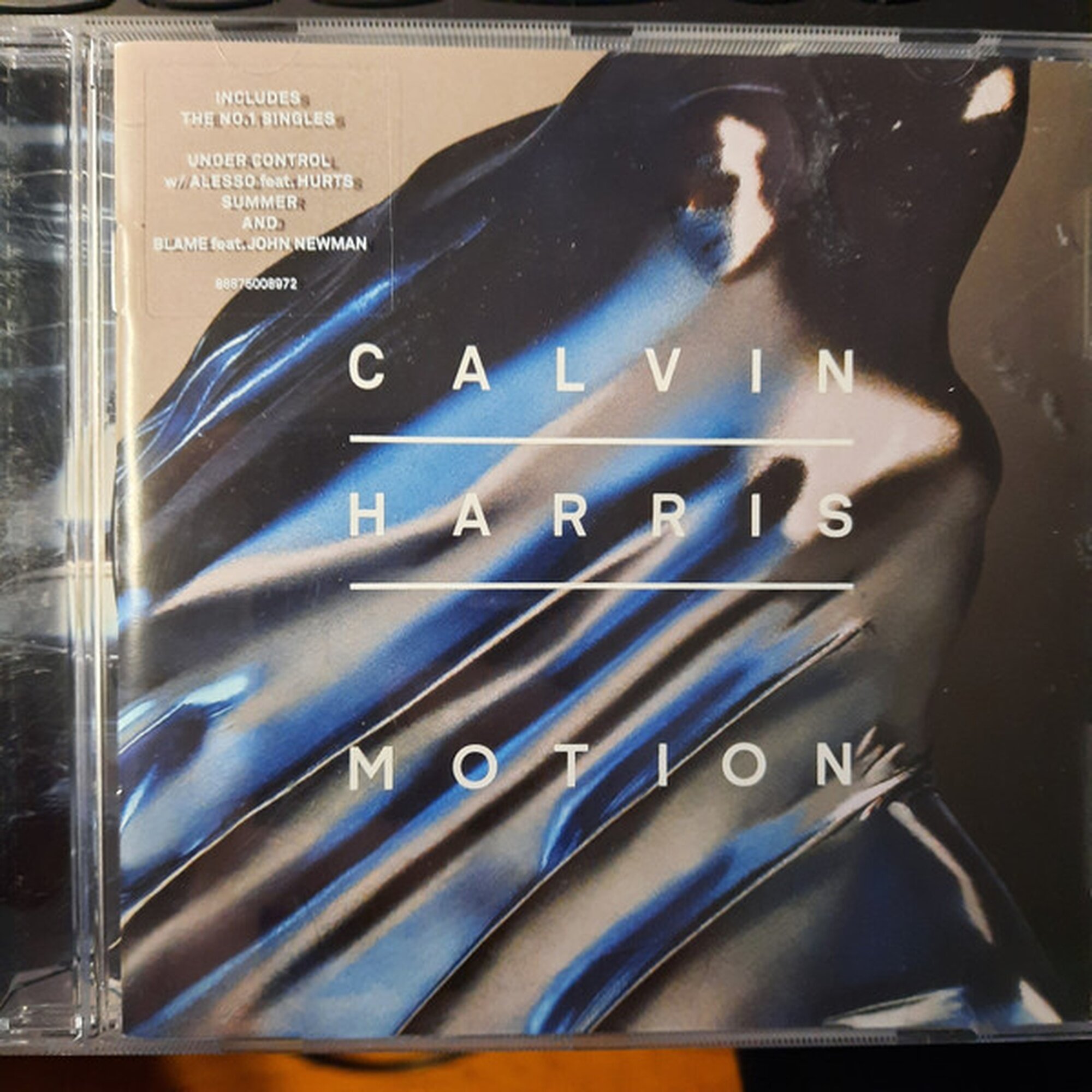 Музыкальный диск Calvin Harris Motion, Audio CD, Album, Columbia, 2014, жанр Lounge, Chillout, Downtempo
