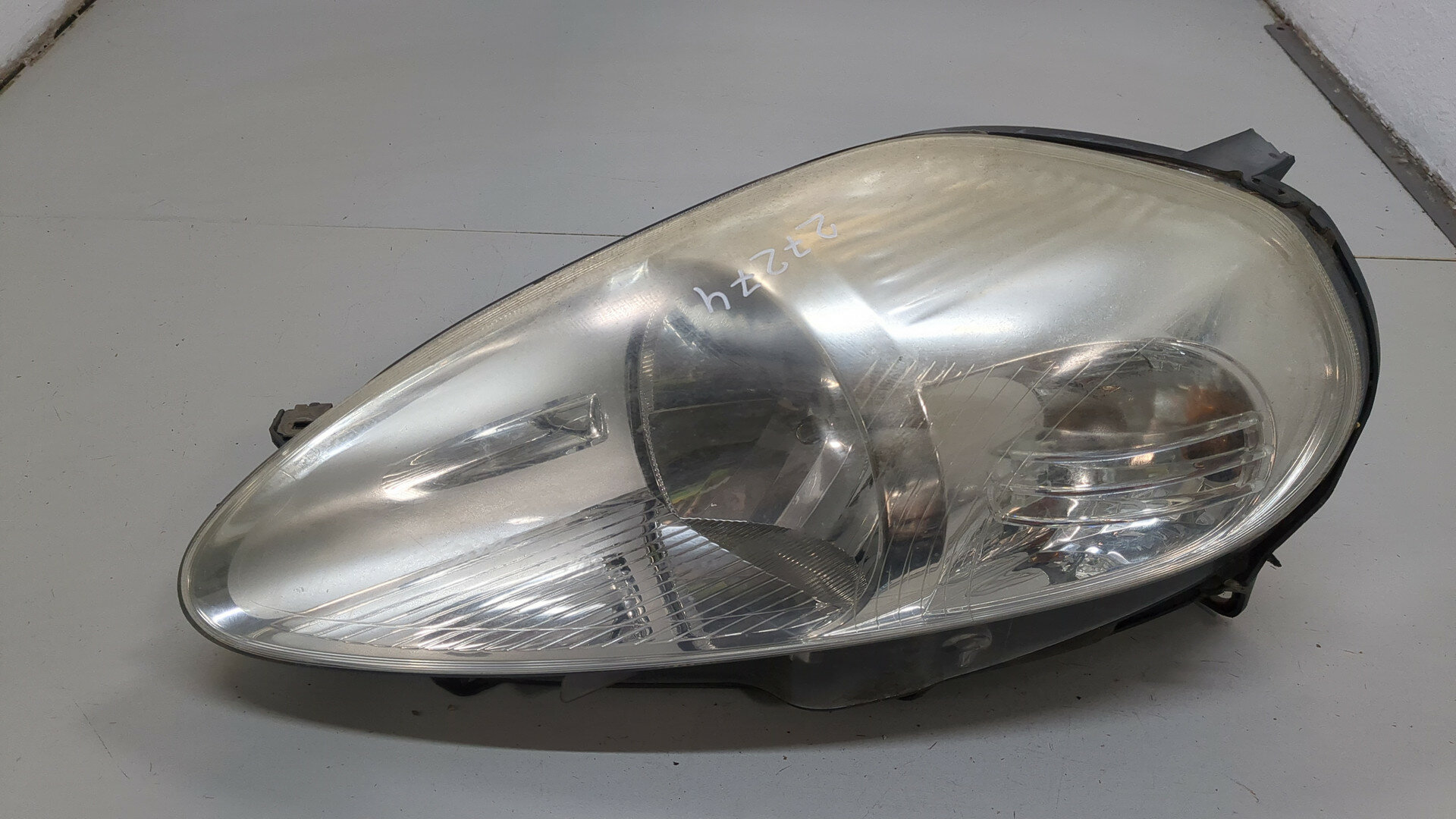 Фара (передняя) левая Fiat Grande Punto Б/У