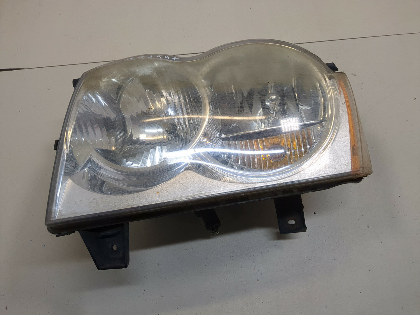 Фара (передняя) левая Jeep Grand Cherokee Б/У