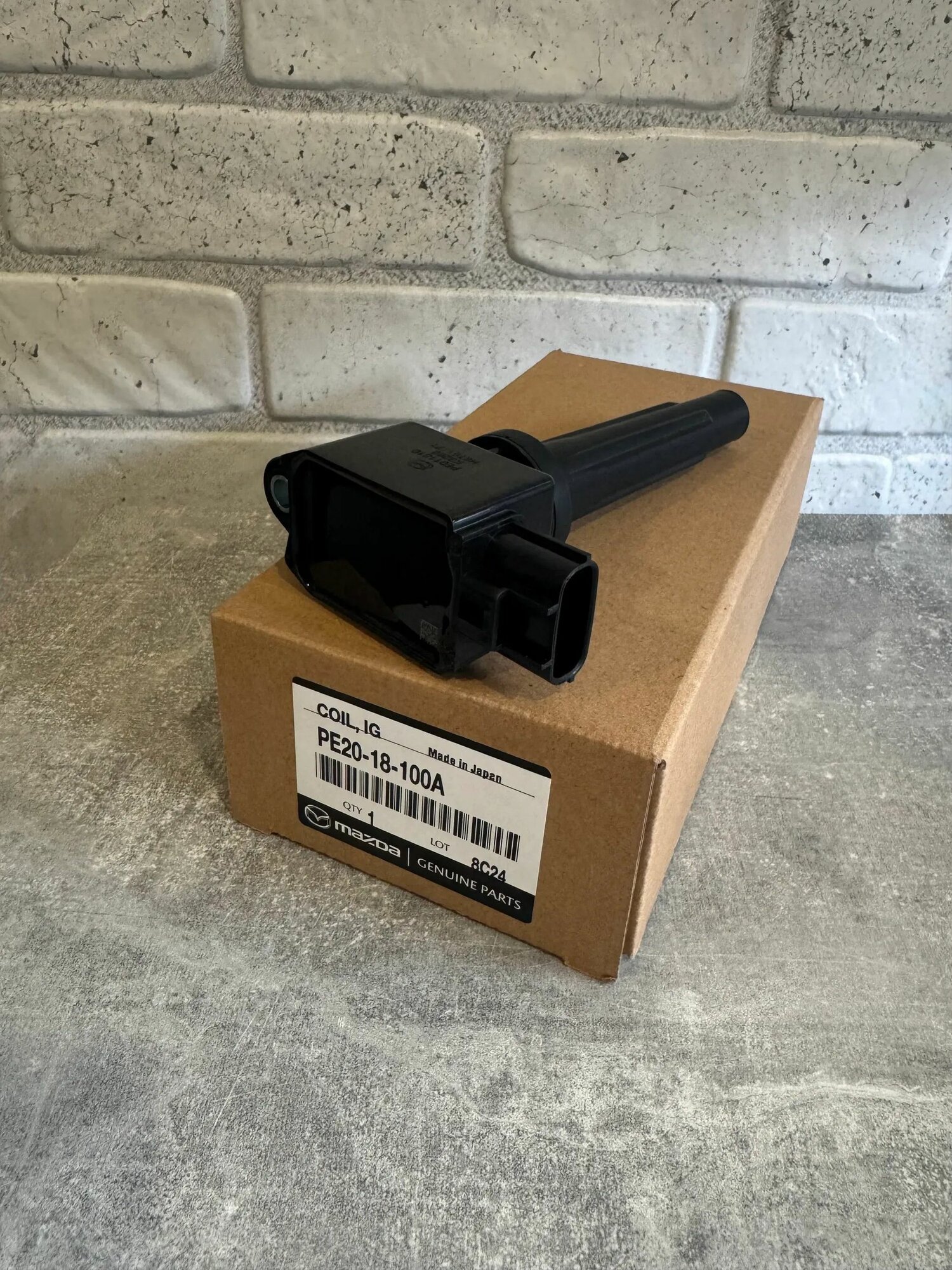 PE2018100A Оригинальная катушка зажигания Mazda