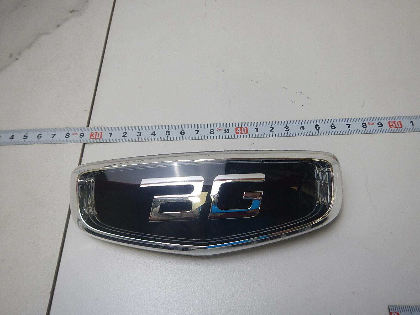 Б/У Эмблема, Geely (Джили)-COOLRAY (20-) GEELY COOLRAY (BELGEE X50) (20-) Потертости, сломано 2 крепления. 636945 GEELY ...